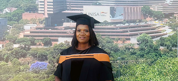 Security officer graduates with honours and is pursuing master's degree